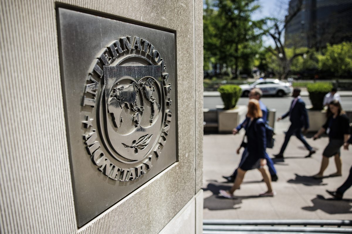 IMF lowers global growth forecast, warns of increasing risks