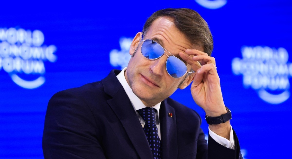 Macron’s Davos shades crash website of Italian maker, boosting shares